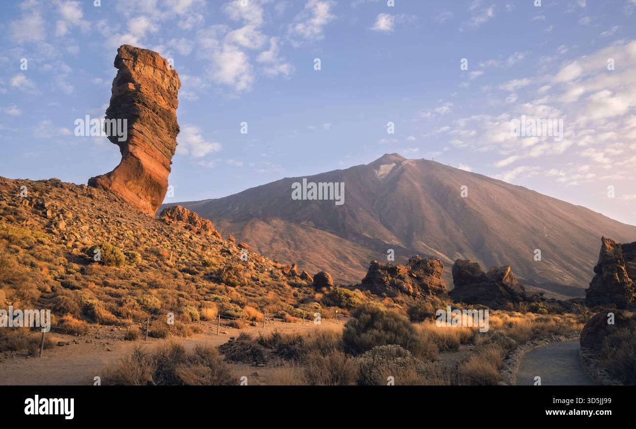 A breathtaking sunrise over unique rock formations and majestic Mount ...