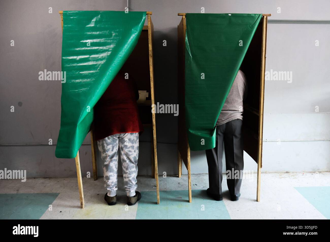 People cast their votes during the 2025 Chilean presidential elections ...