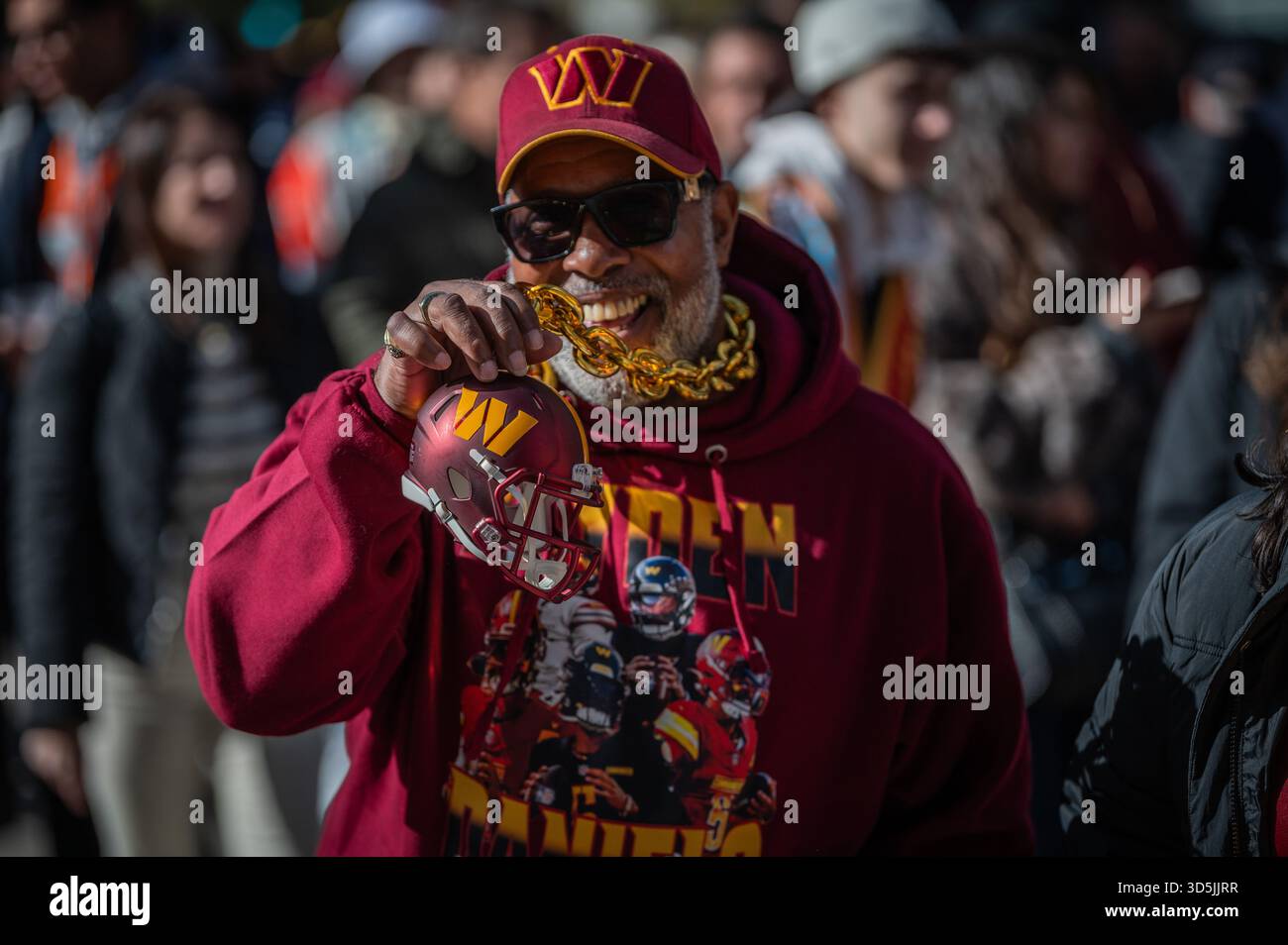 Washington Commanders football fan poses for a picture ahead of the NFL ...