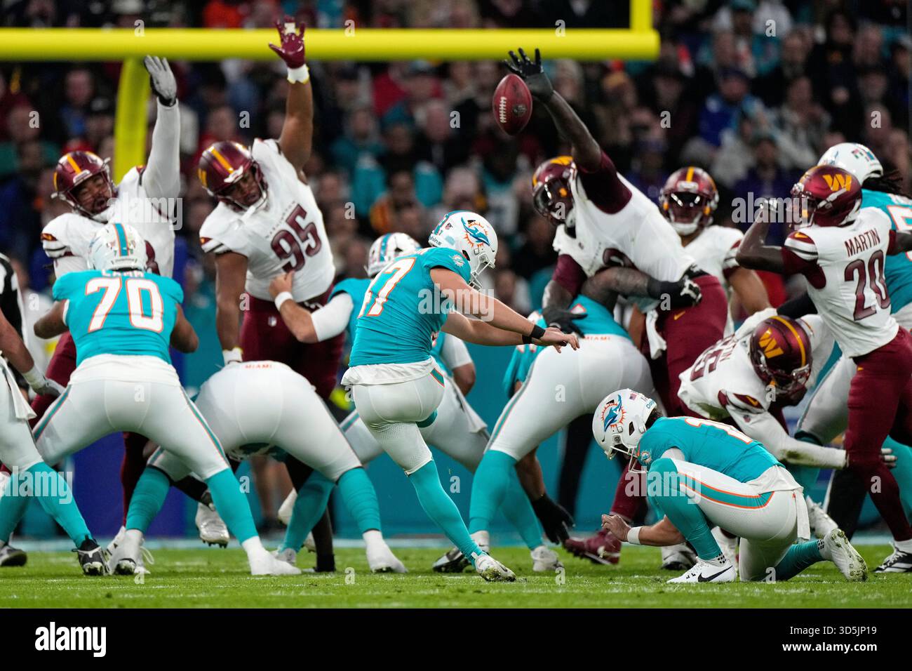 Miami Dolphins place kicker Riley Patterson (47) kicks a field goal ...