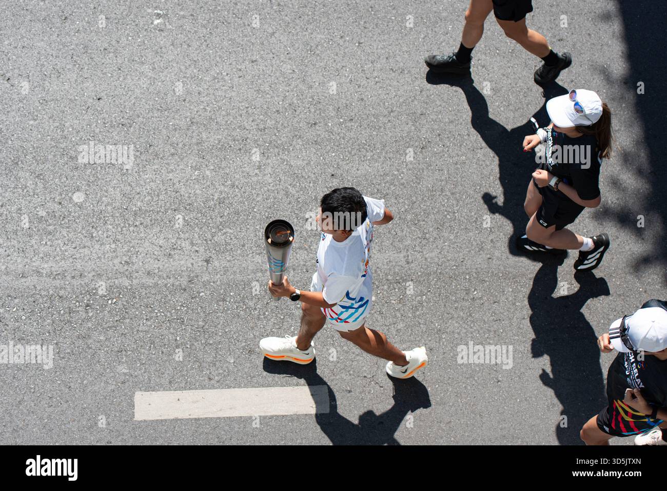 Nattawat Innum Thai national runner, of the 33rd SEA Games Torch Relay ...