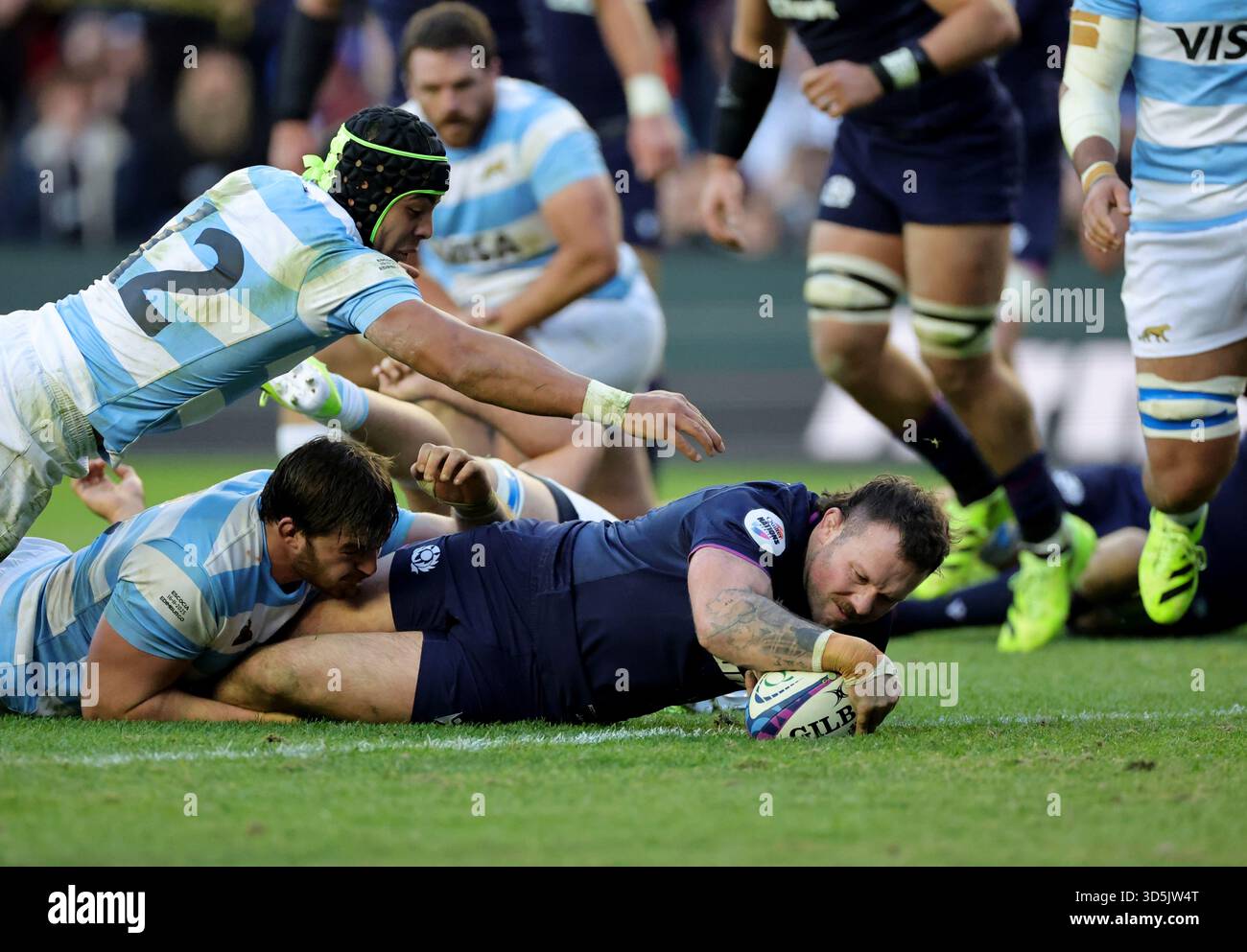 Scotland's Ewan Ashman scores his sides second try during the Quilter ...