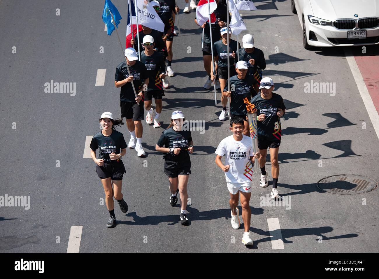 Nattawat Innum Thai national runner, of the 33rd SEA Games Torch Relay at Bangkok in Thailand on ...