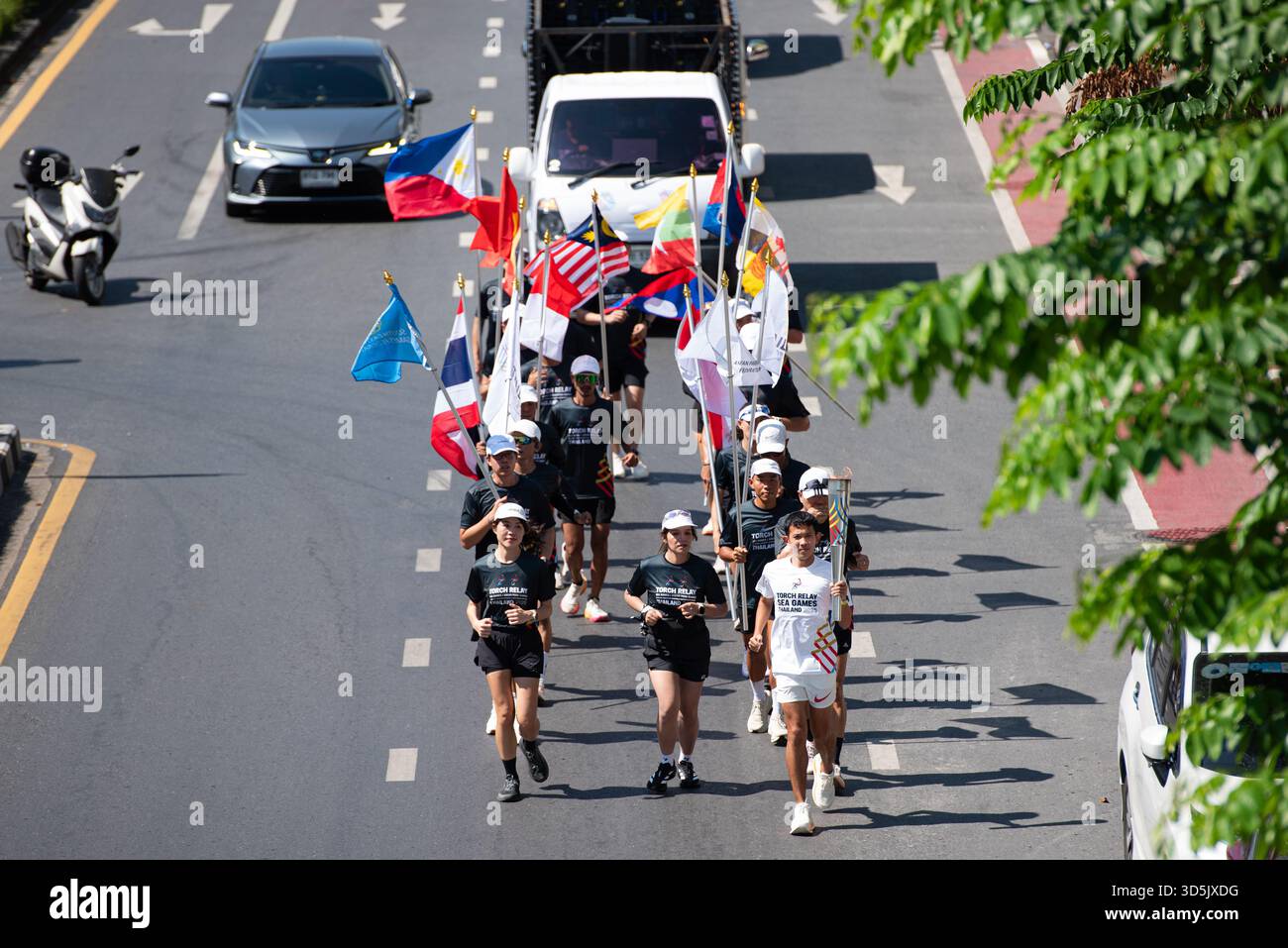 Nattawat Innum Thai national runner, of the 33rd SEA Games Torch Relay ...