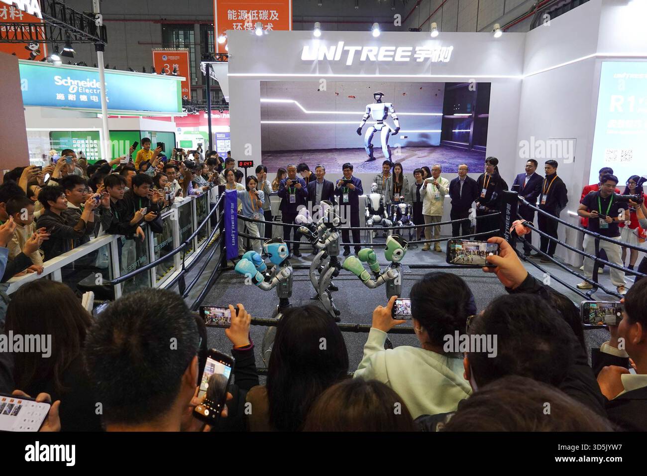 The Unitree booth features robotic demonstrations at the 8th China ...