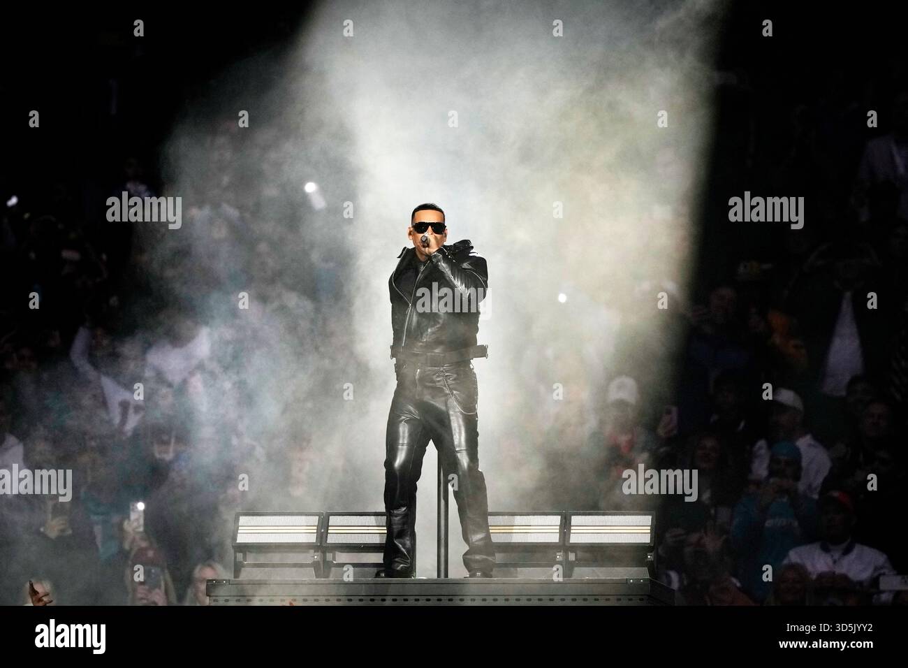 Daddy Yankee performs during halftime of an NFL football game between ...