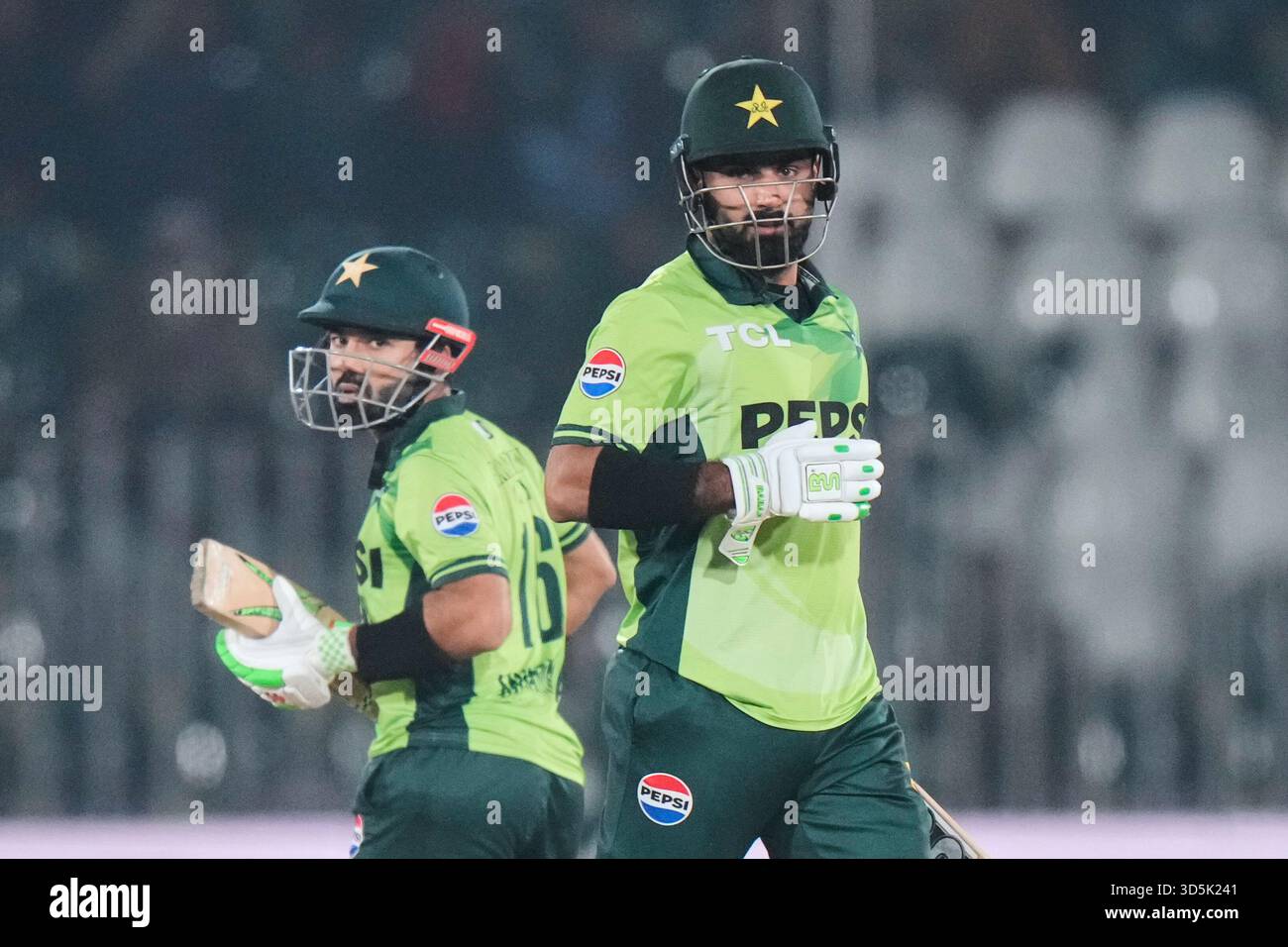 Pakistan's Hussain Talat, right, and Mohammad Rizwan run between the ...