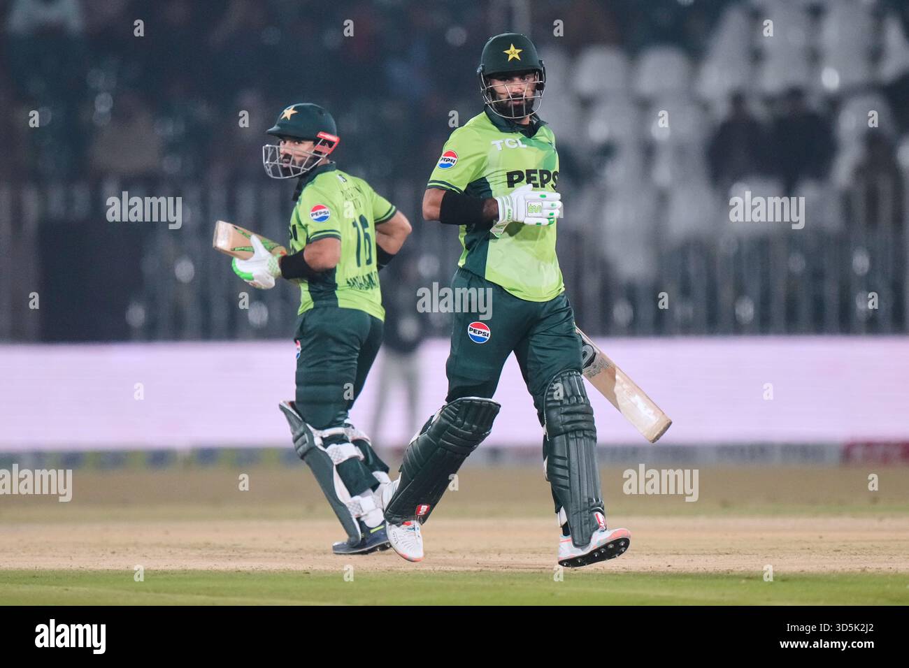 Pakistan's Hussain Talat, right, and Mohammad Rizwan run between the ...