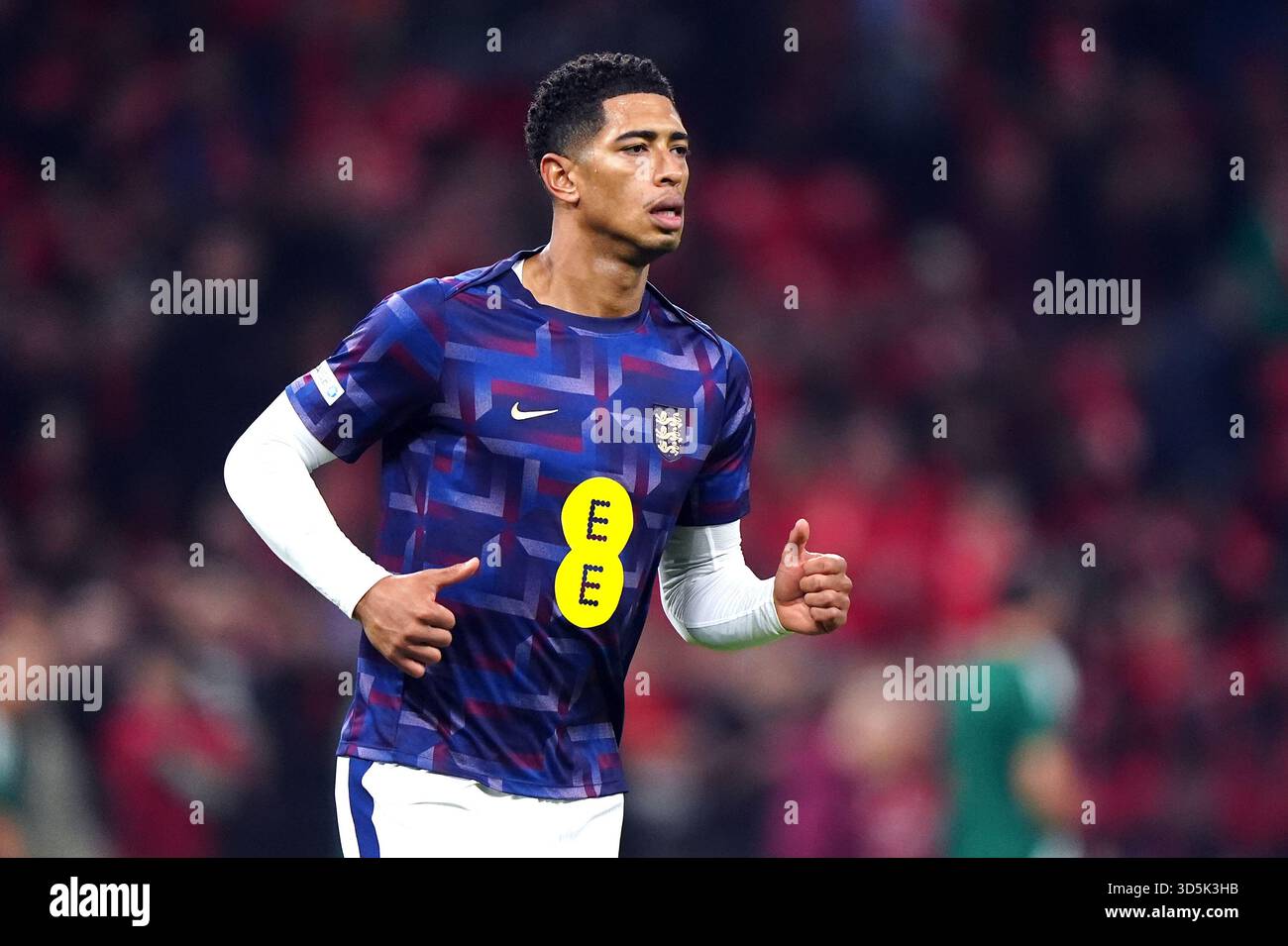 England's Jude Bellingham warming up prior to kick-off before the FIFA ...