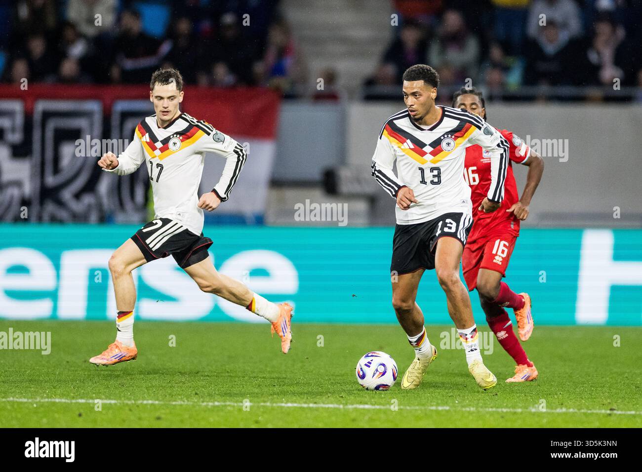 Florian Wirtz (Germany, 17), Felix Nmecha (Germany, 13) on the ball ...