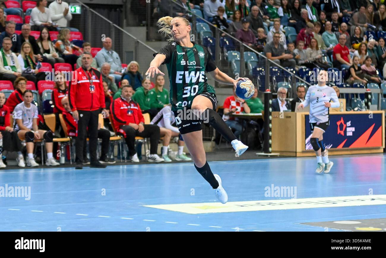 Jenny Behrend (VfL Oldenburg, #30) during the jump shot RK Dalmantinka ...