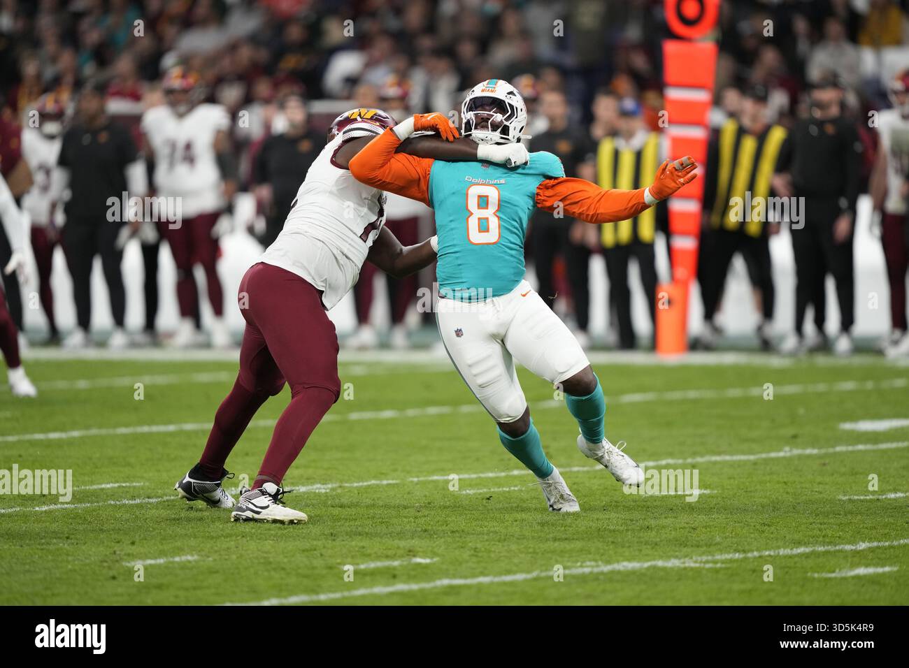 Miami Dolphins outside linebacker Matthew Judon (8) is hit as he plays ...