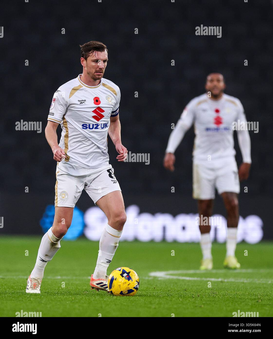Milton Keynes Dons Alex Gilbey in action during the Sky Bet League Two ...