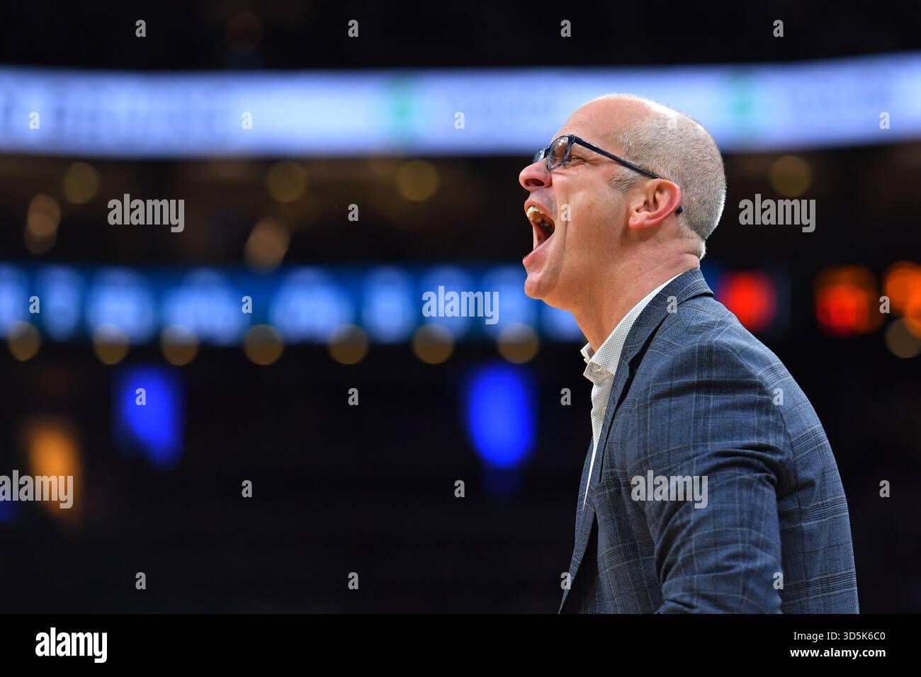UConn head coach Dan Hurley shouts to his players from the bench in the ...