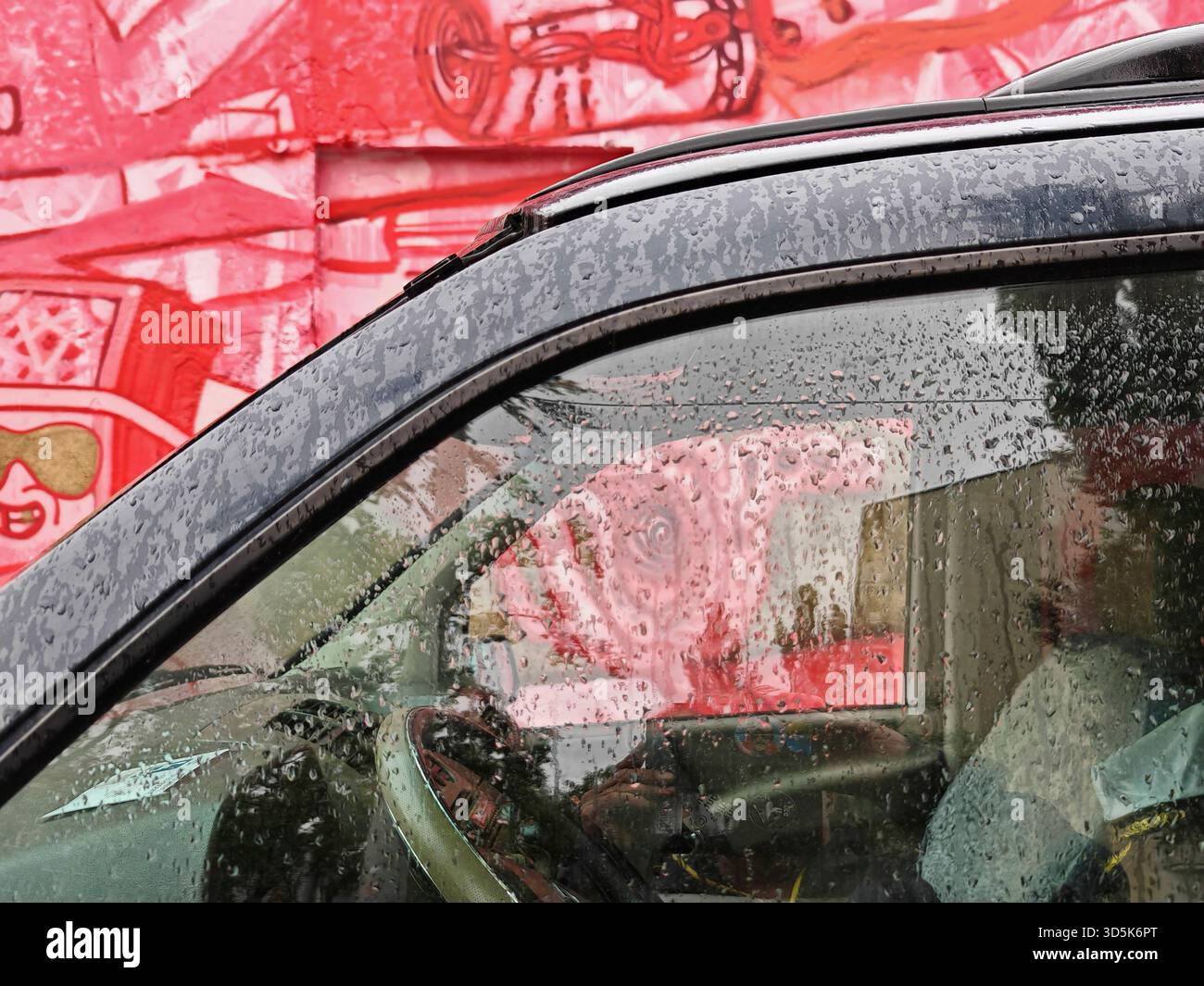 bad weather conditions and poor visibility in road traffic on a rainy ...