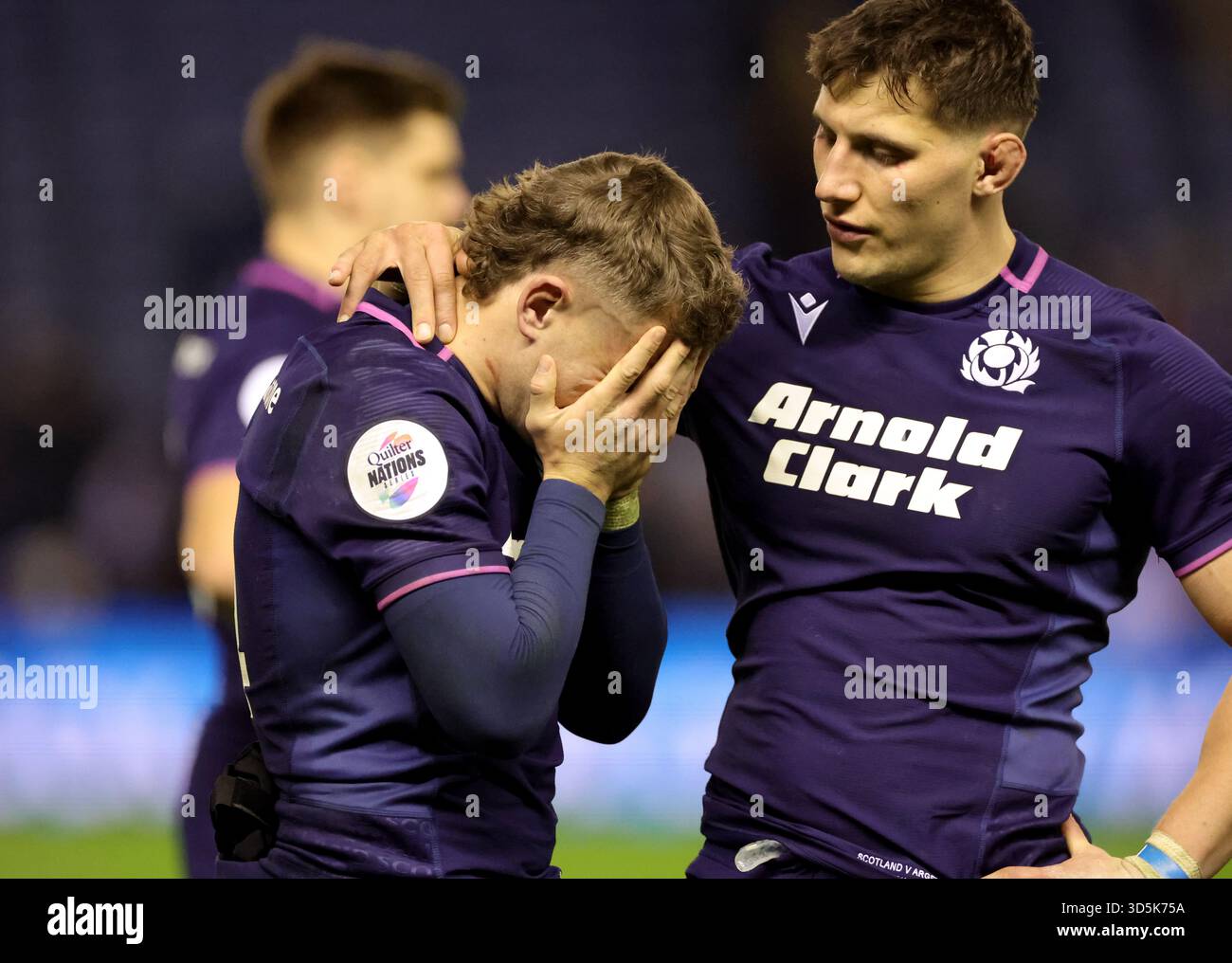 Scotland's Darcy Graham (left) is consoled by Rory Darge after the ...