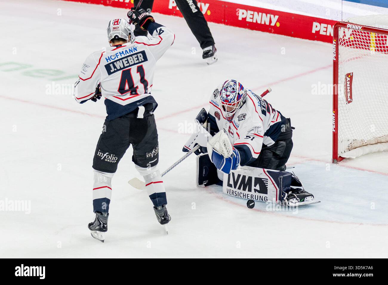 Jakob Weber (Nuremberg Ice Tigers, #41) and Niklas Treutle (goalkeeper ...