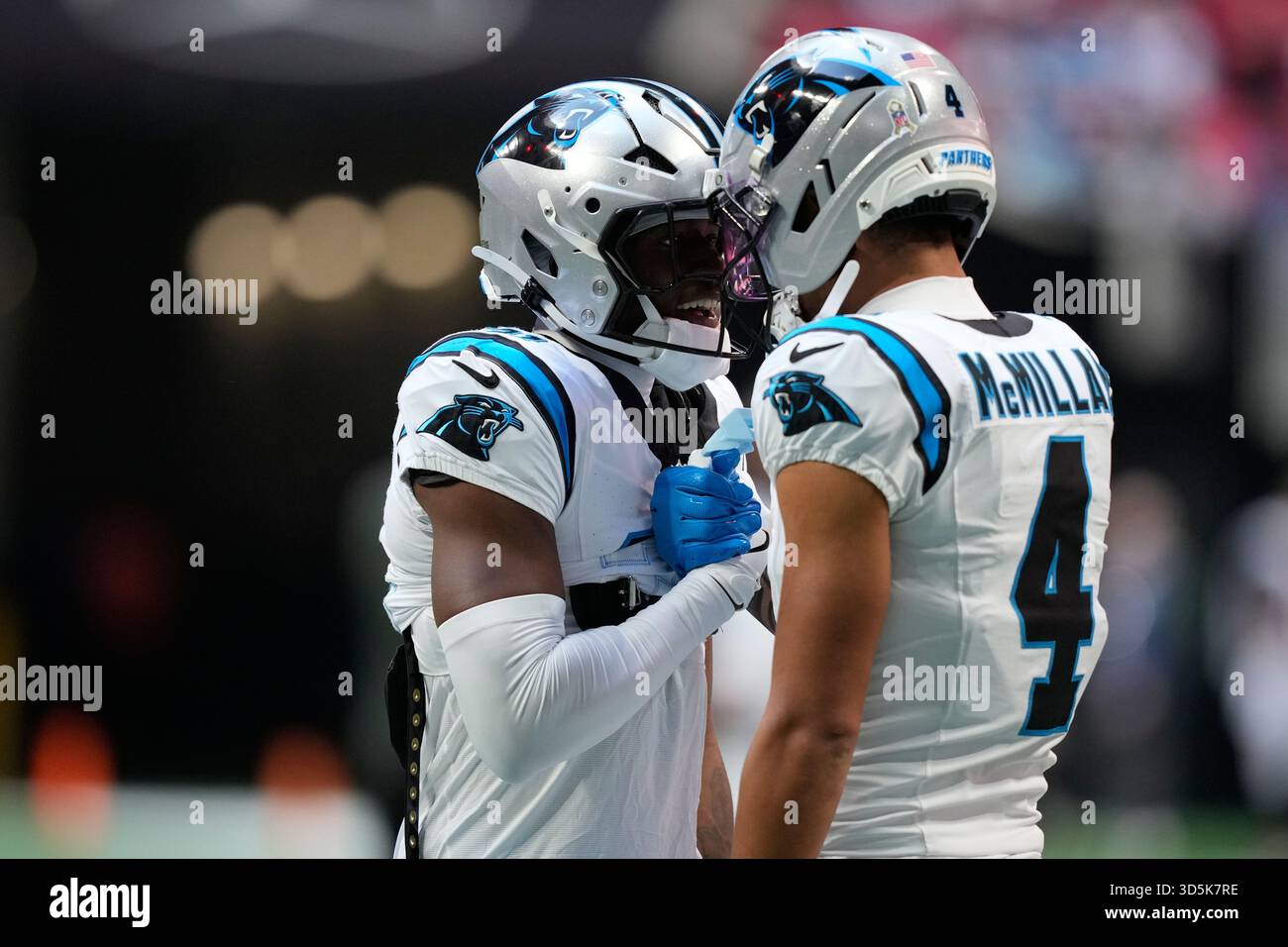 Carolina Panthers wide receiver Tetairoa McMillan (4) and cornerback ...