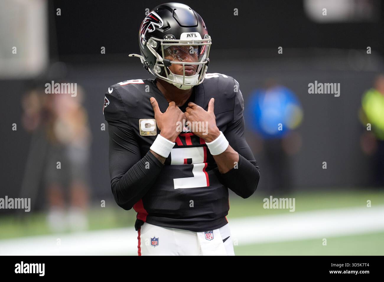 Atlanta Falcons quarterback Michael Penix Jr. (9) warms up before an ...