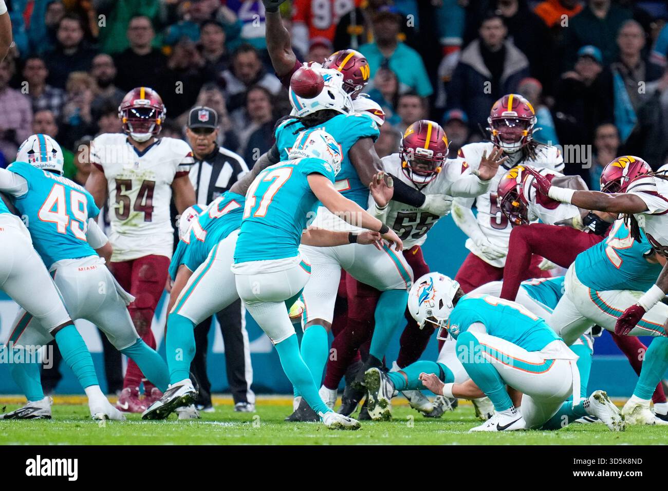 Miami Dolphins place kicker Riley Patterson (47) kicks a field goal ...