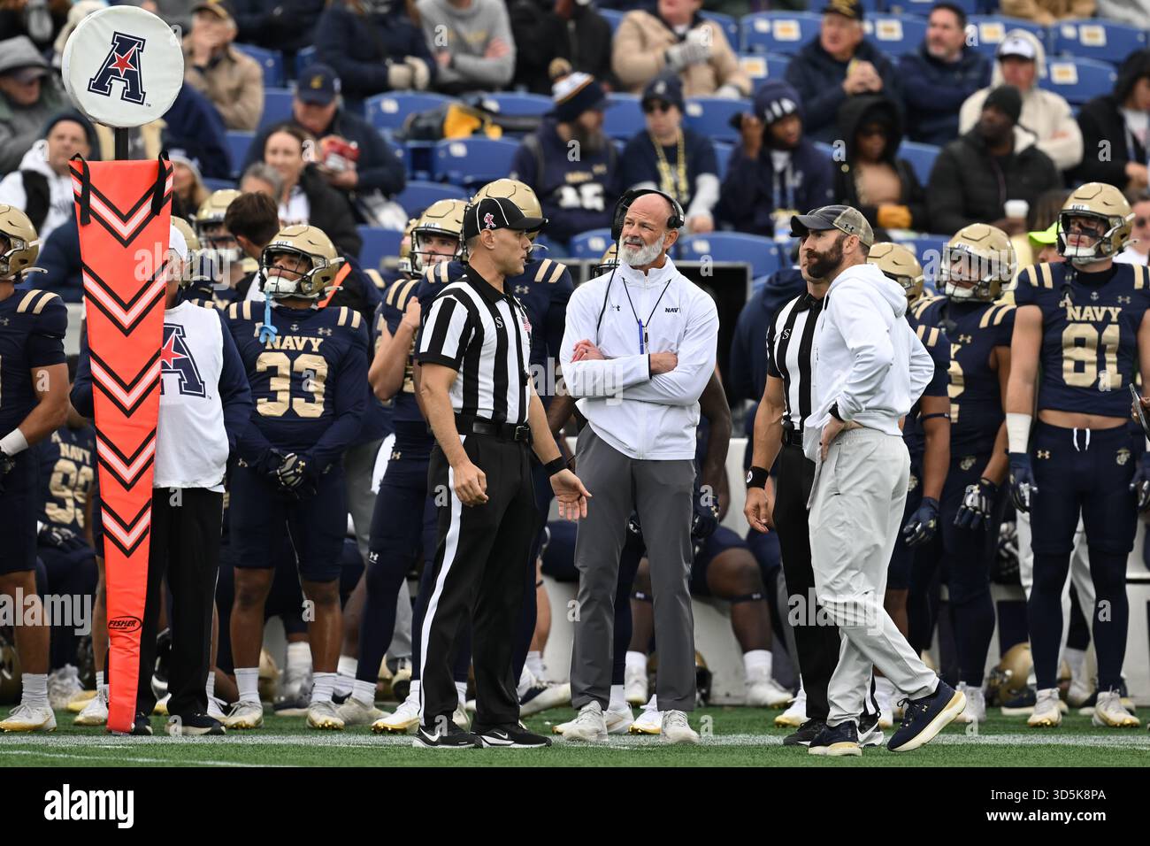 Navy head coach Brian Newberry, center, looks on against South Florida ...