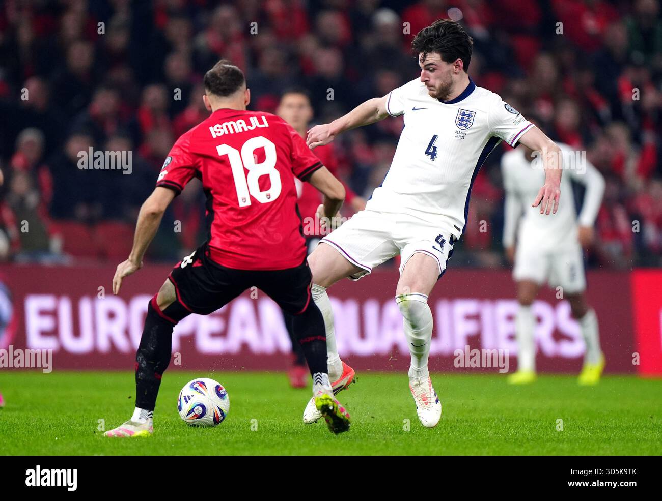 England's Declan Rice (right) and Albania's Ardian Ismajli battle for ...
