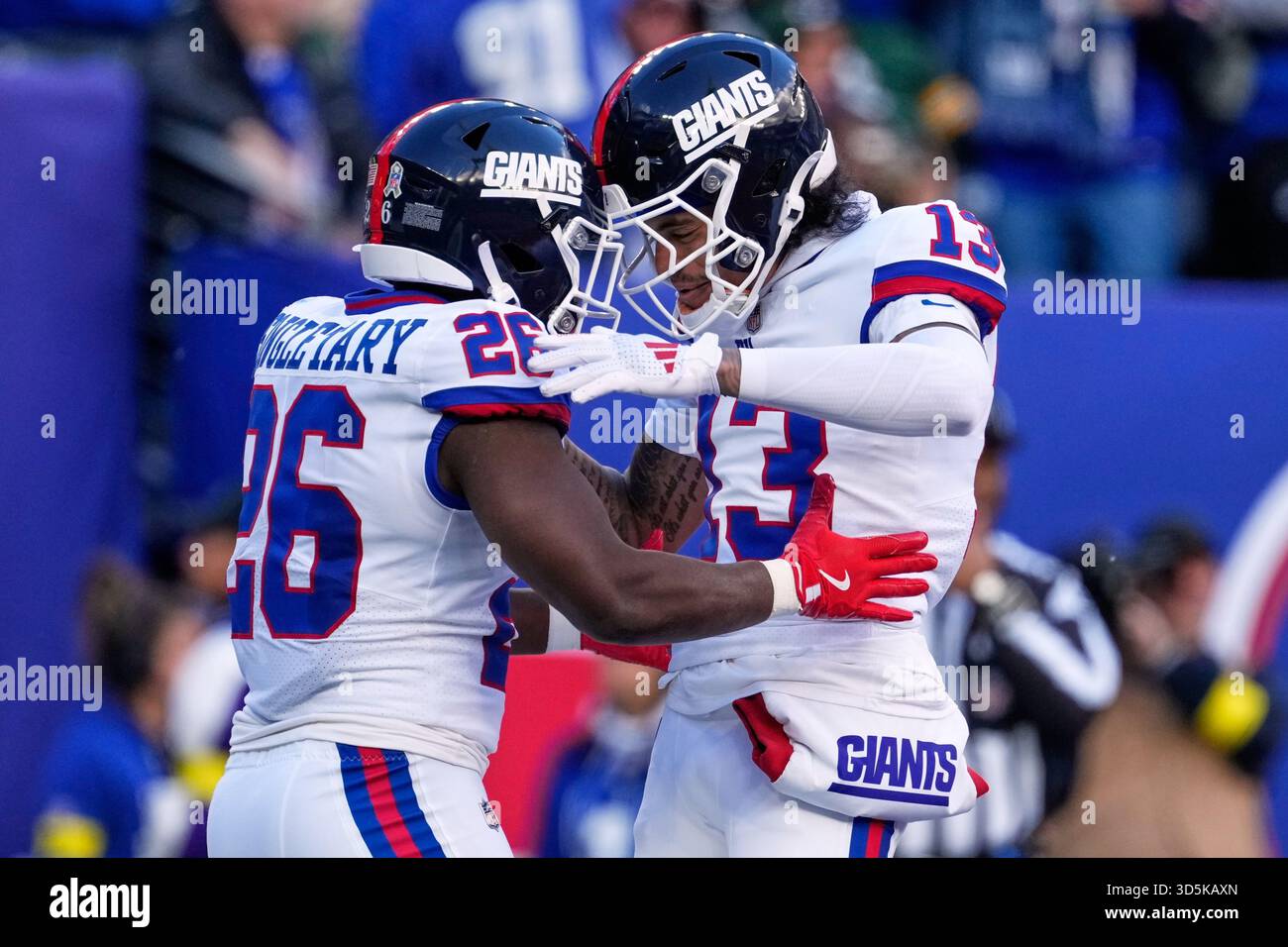New York Giants' Devin Singletary celebrates his touchdown run with ...