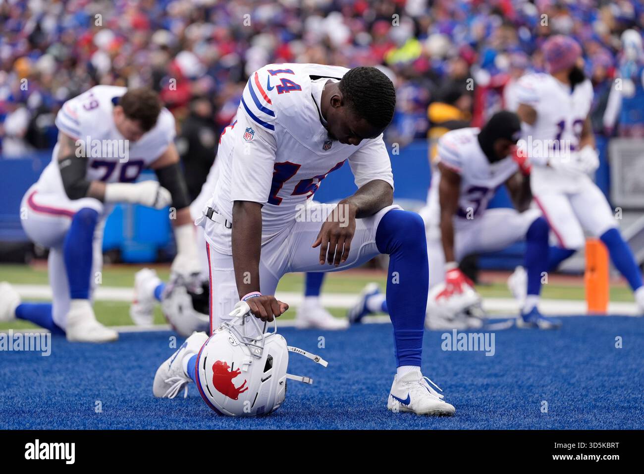Buffalo Bills wide receiver Tyrell Shavers (14) prays before the first ...