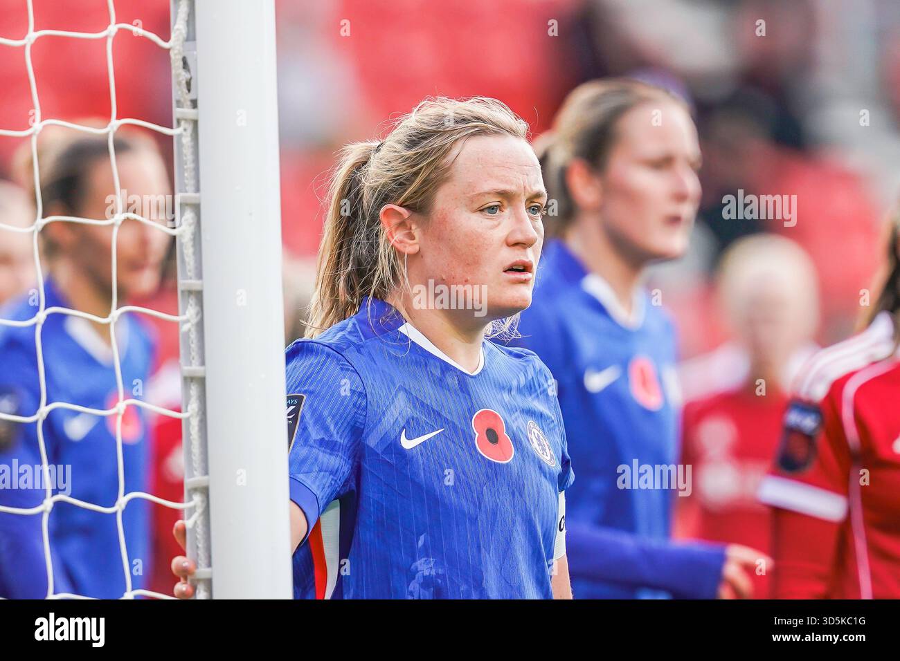 ST HELENS, ENGLAND - November 16: Erin Cuthbert of Chelsea FC defending ...