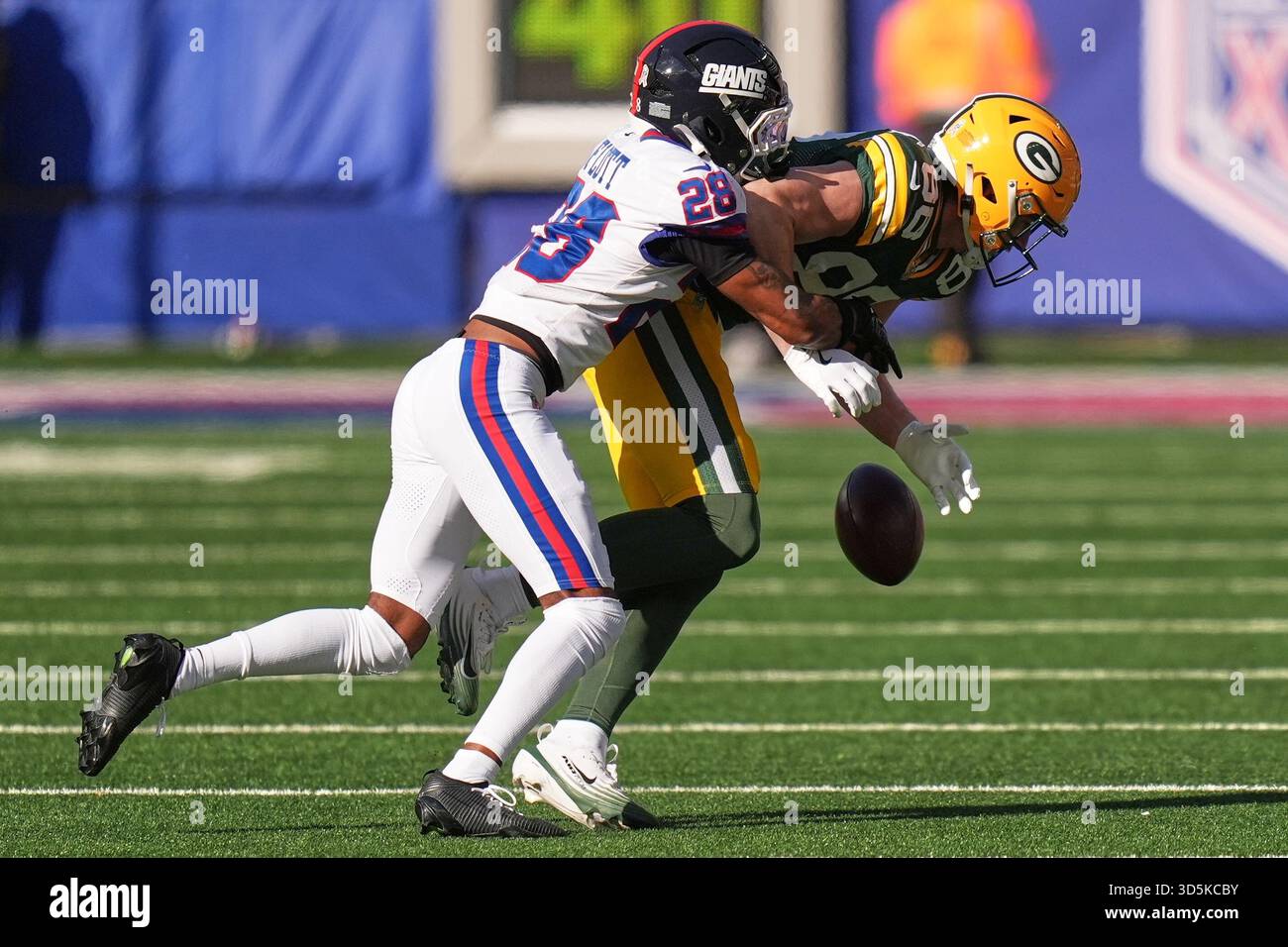 Green Bay Packers' Luke Musgrave fumbles as he is hit by New York ...