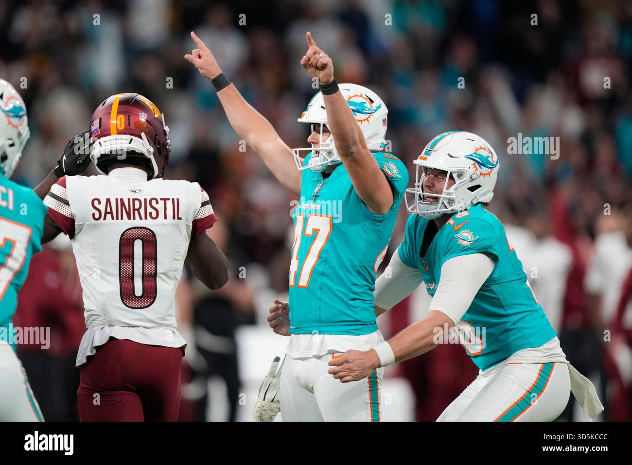 Miami Dolphins kicker Riley Patterson (47) celebrates after kicking the ...