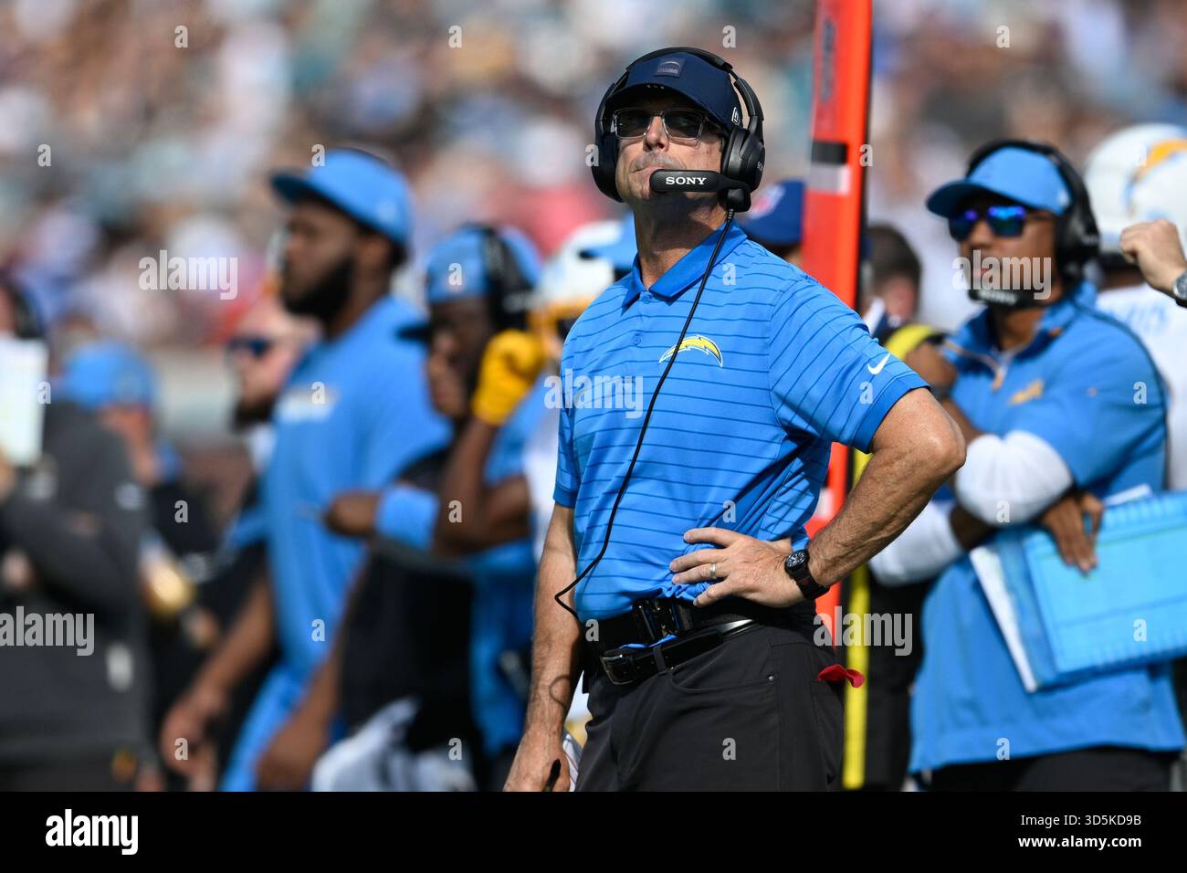 Los Angeles Chargers head coach Jim Harbaugh watches during the first ...