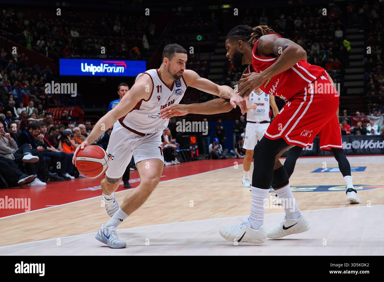 John Petrucelli (Trapani Shark) & Devin Booker (EA7 Emporio Armani Olimpia Milano) during EA7 ...