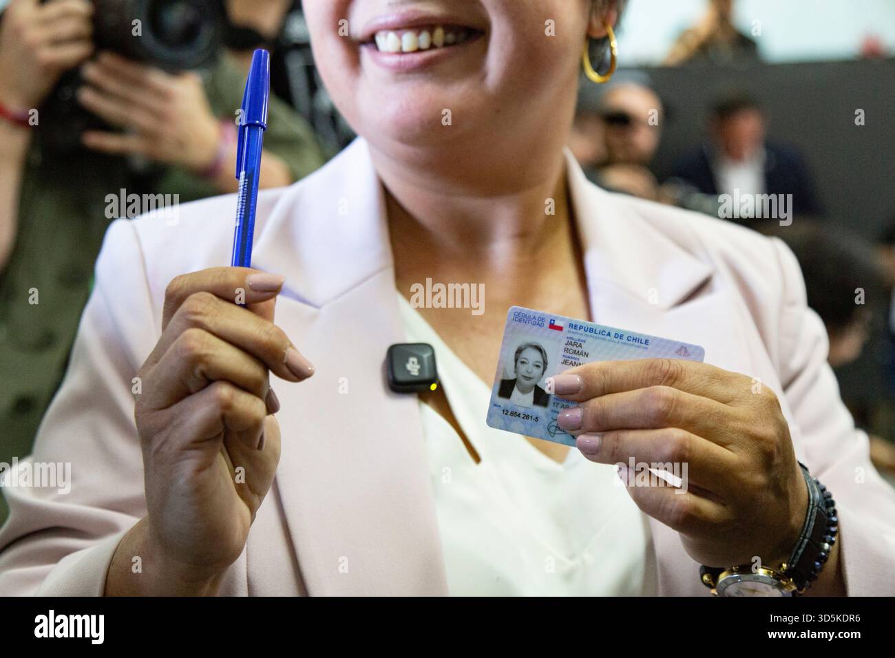 Communist presidential candidate Jeannette Jara displays her ID and ...