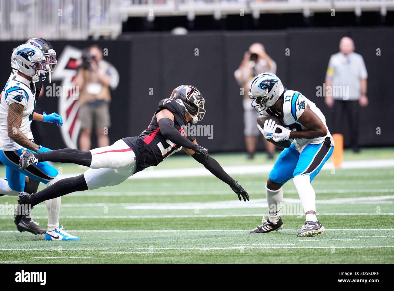 Carolina Panthers wide receiver Xavier Legette (17) pulls in a pass ...