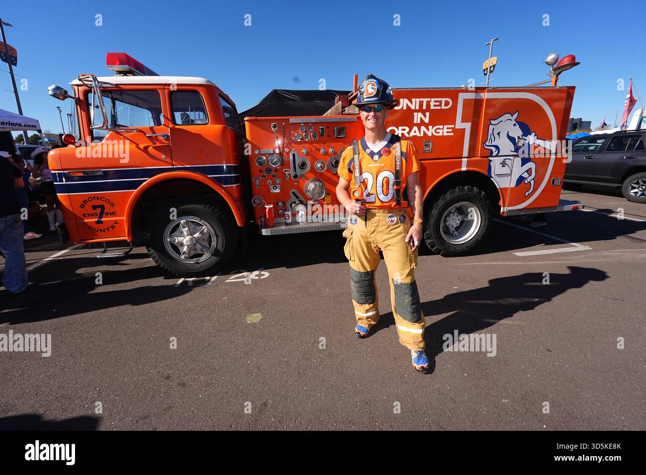 Rob the firefighter shows off his rig decorated in honor of the Denver ...