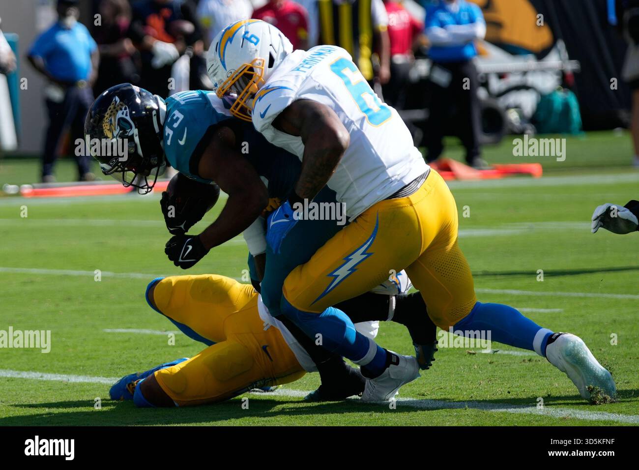 Jacksonville Jaguars running back Bhayshul Tuten (33) goes in for a ...