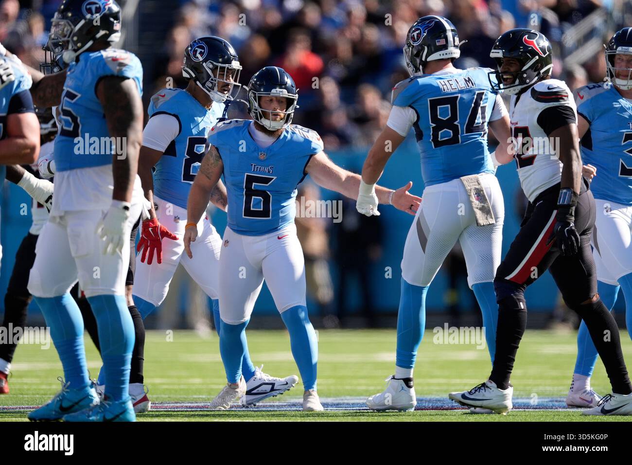 Tennessee Titans kicker Joey Slye (6) is congratulated after kicking a ...