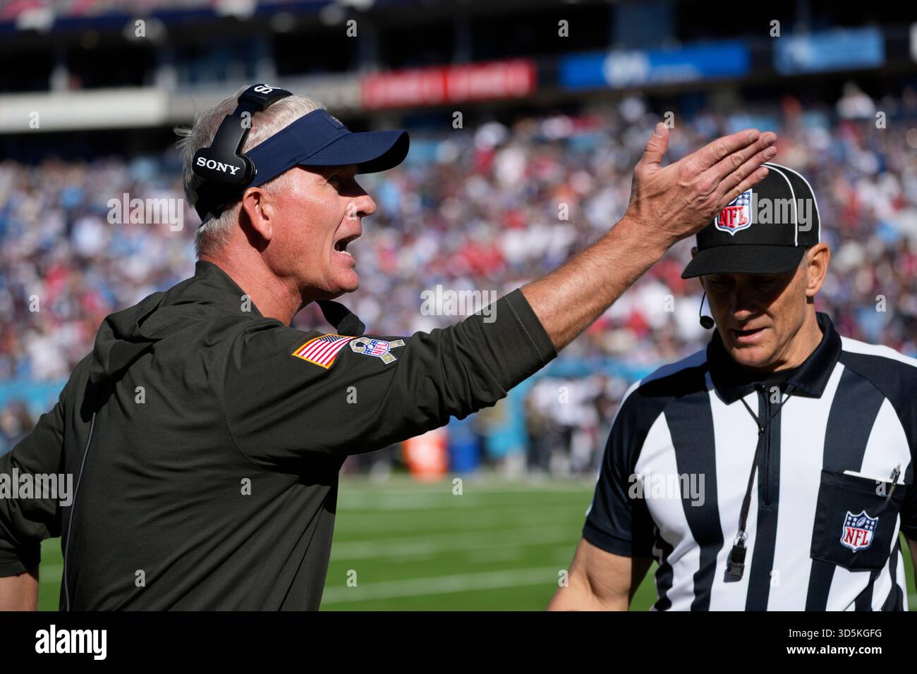Tennessee Titans interim head coach Mike McCoy argues a call during the ...