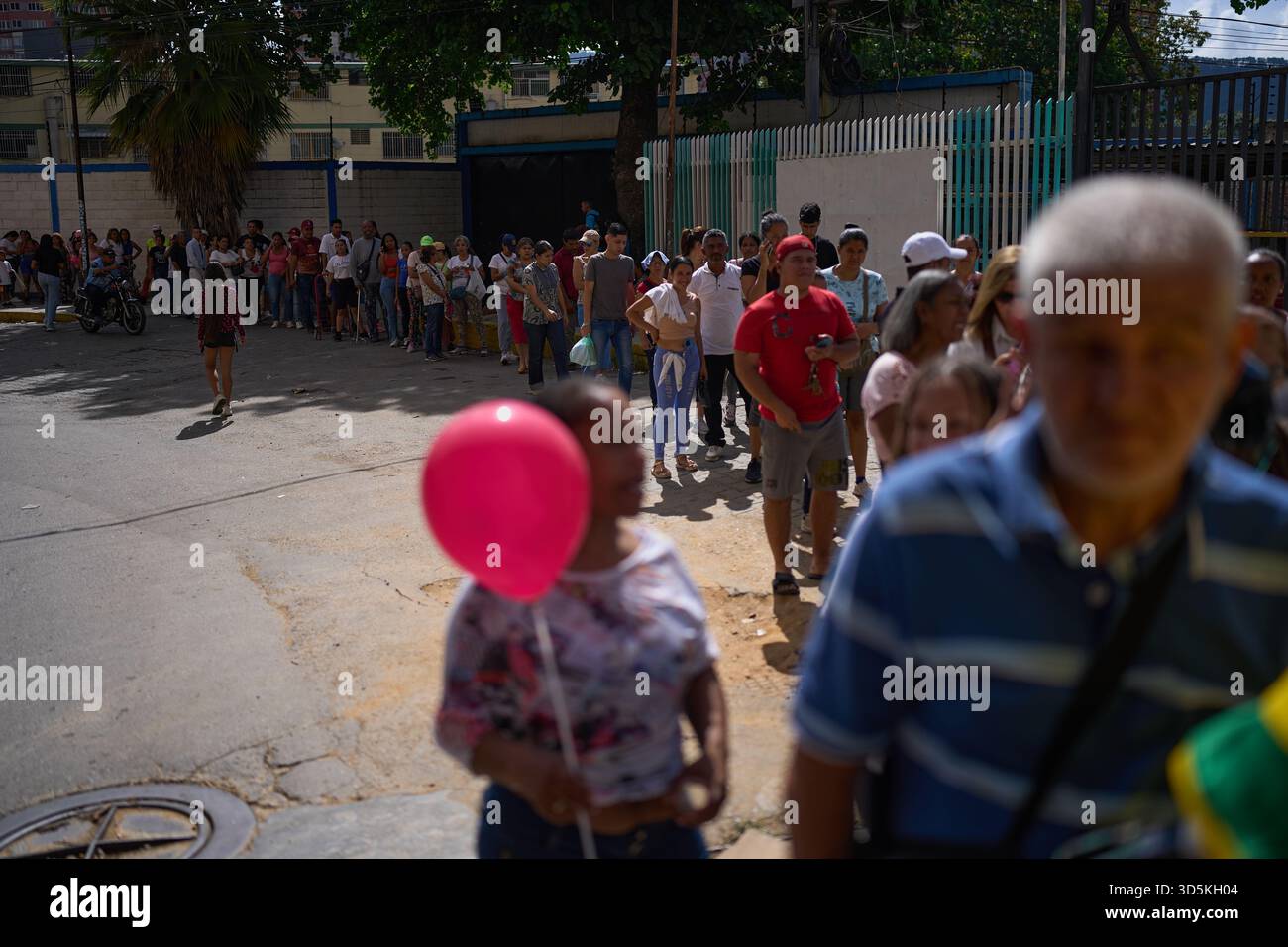 Shoppers line up to buy food at a government-subsidized Christmas ...
