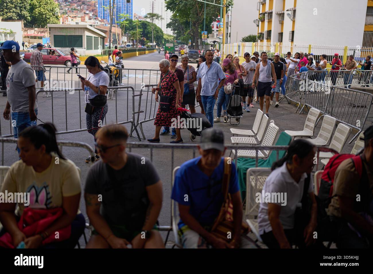 Shoppers line up to buy food at a government-subsidized Christmas ...