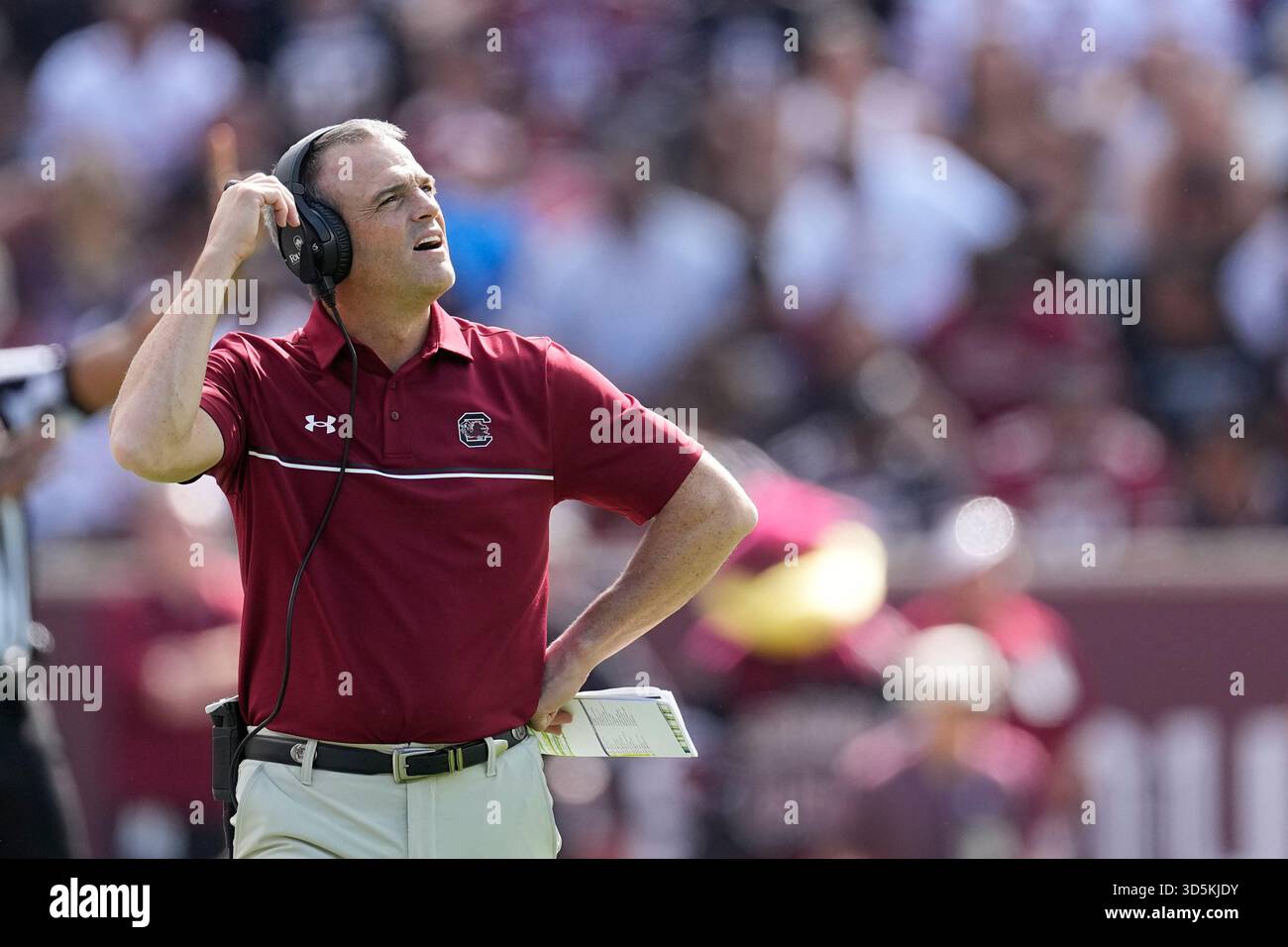 South Carolina head coach Shane Beamer looks up at the scoreboard ...