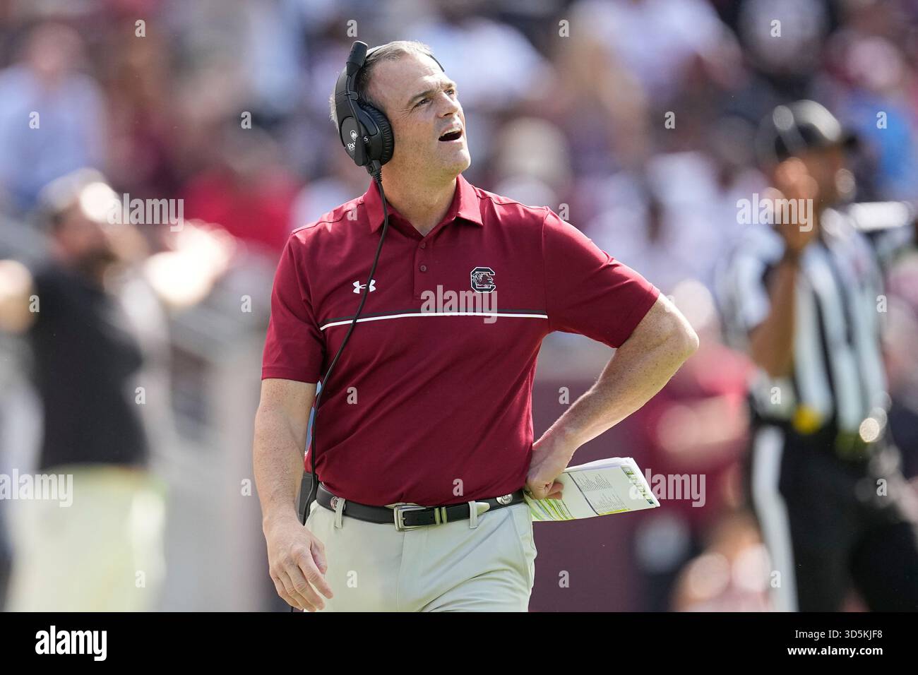 South Carolina head coach Shane Beamer looks up at the scoreboard ...