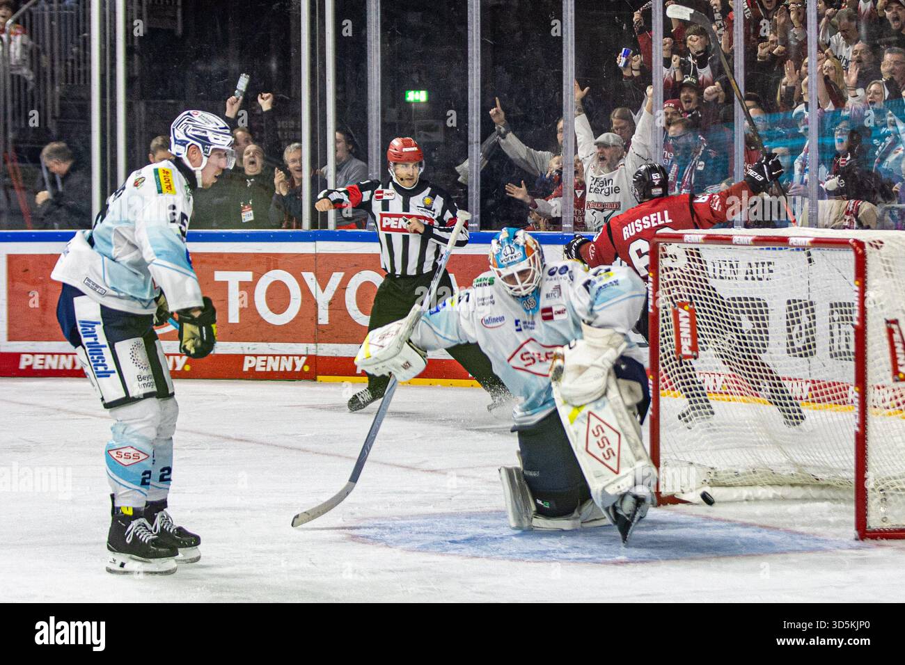 Patrick Russell (Cologne Sharks, #63) celebrates and Jussi Olkinuora ...