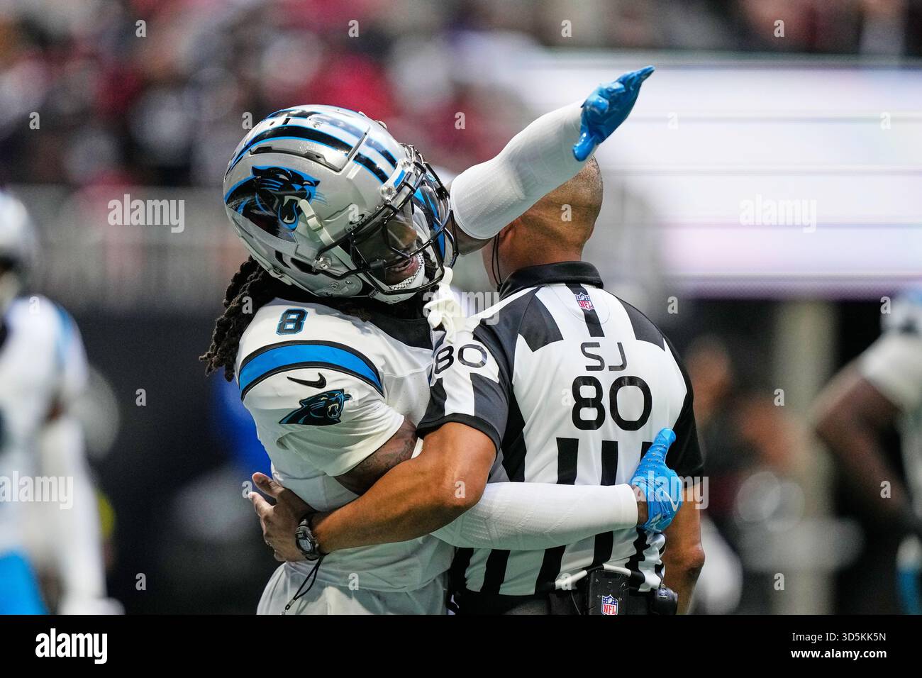 Carolina Panthers cornerback Jaycee Horn (8) shows side judge Alonzo ...
