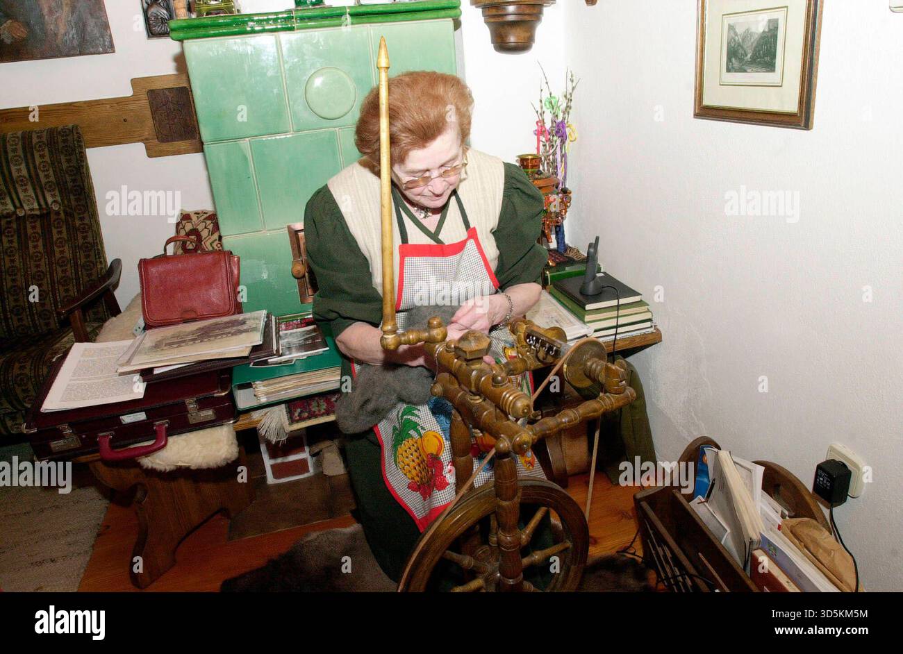 traditional wool spinning on a spinning wheel, fashion and design ...