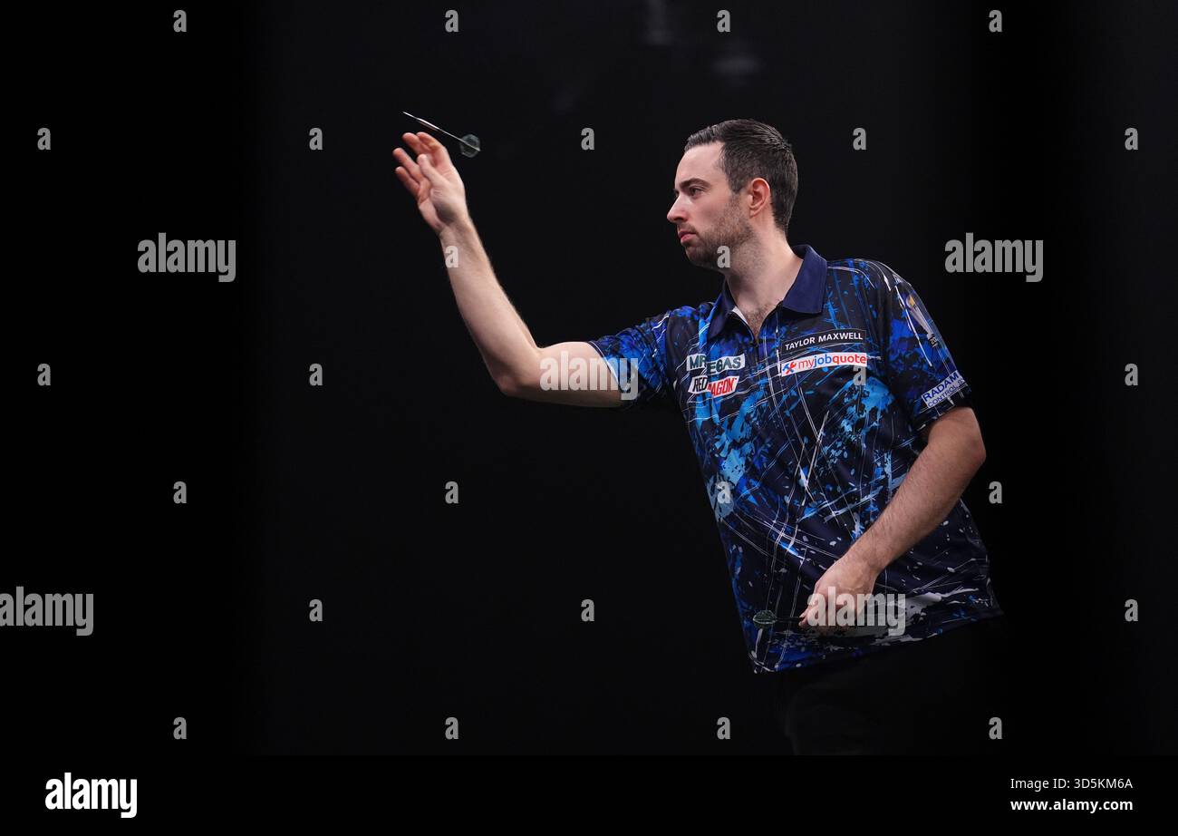 Luke Humphries in action during the final against Luke Littler, at the ...