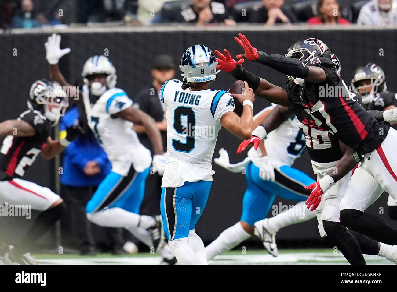 Carolina Panthers quarterback Bryce Young (9) is sacked by Atlanta ...