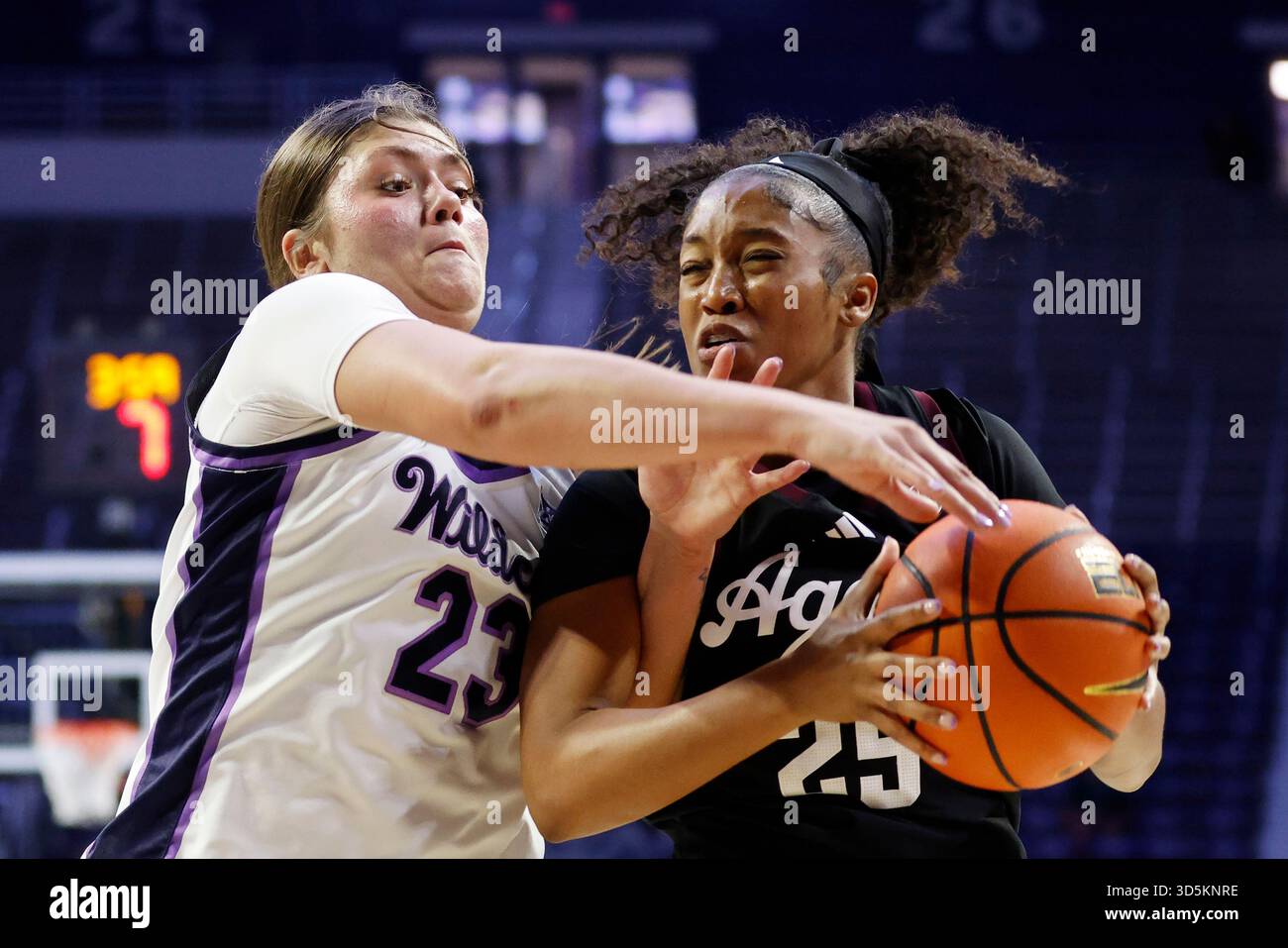 Kansas State guard Jordan Speiser (23) pressures Texas A&M guard Salese ...