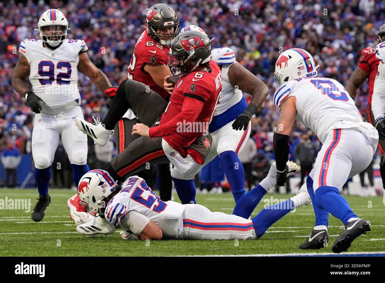 Buffalo Bills linebacker Matt Milano, bottom, tackles Tampa Bay ...